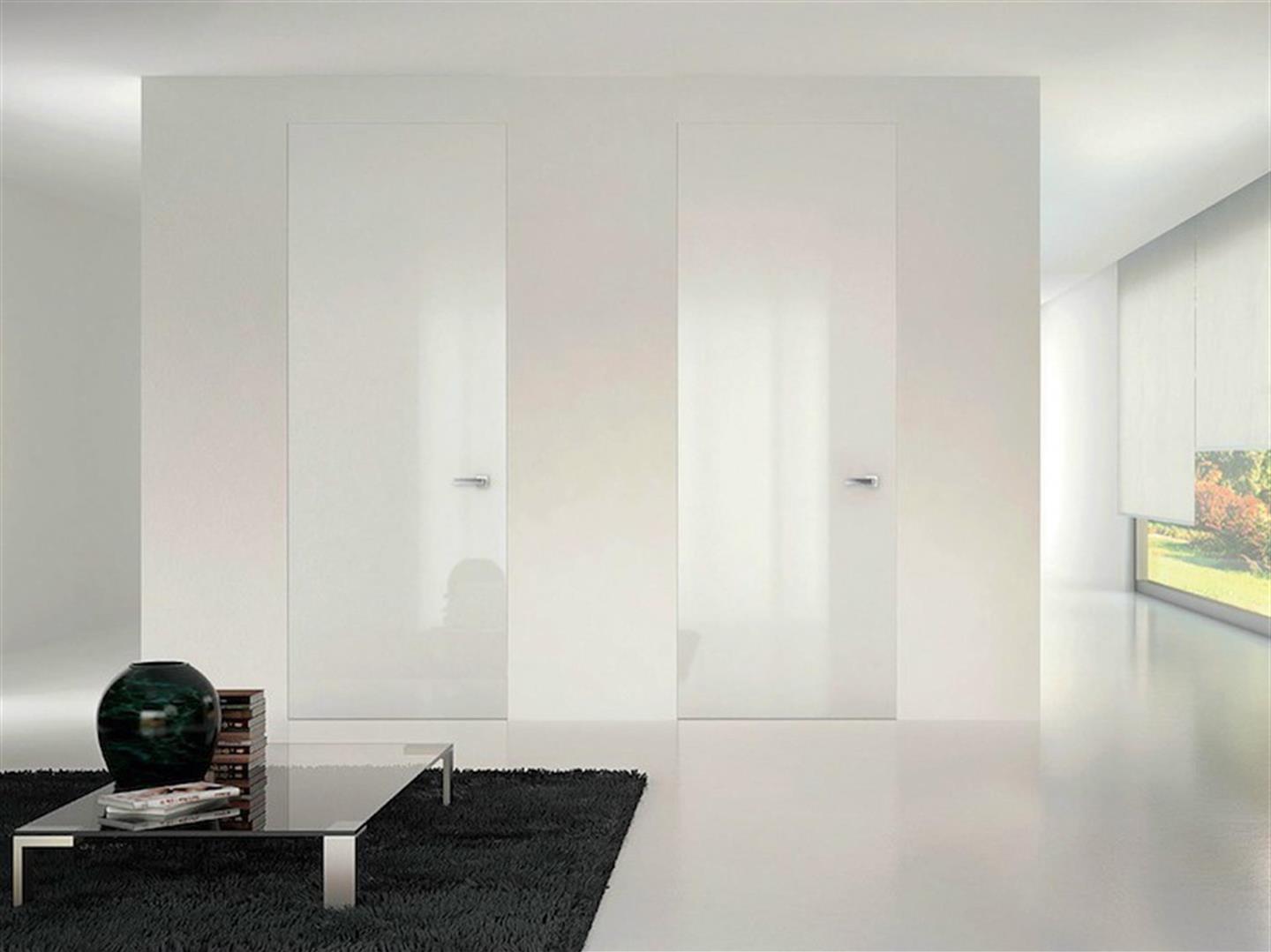 Porte filomuro con apertura a spingere e a tirare o biverso